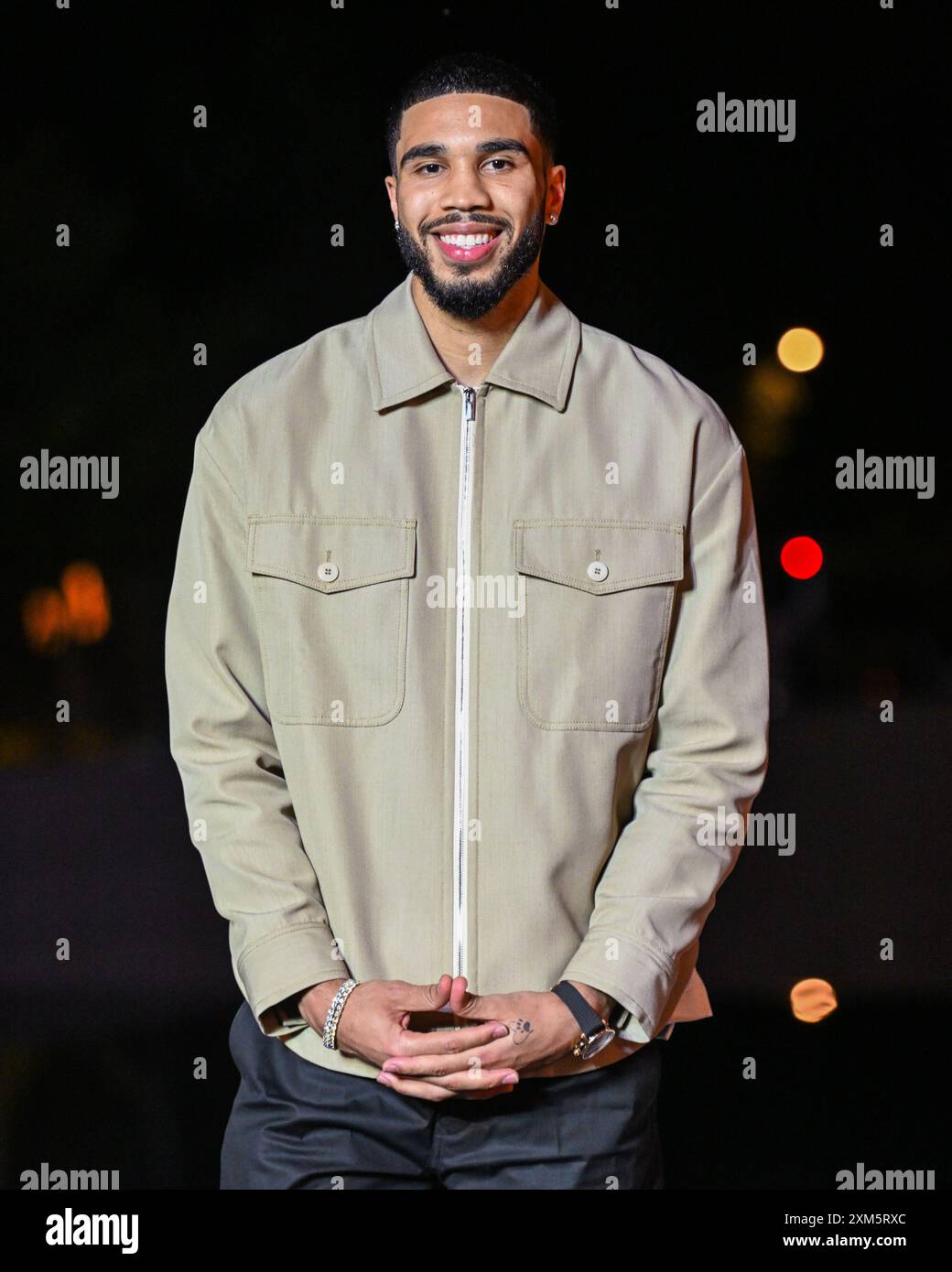 Jayson Tatum posing for photos on the red carpet at The Prelude to the ...