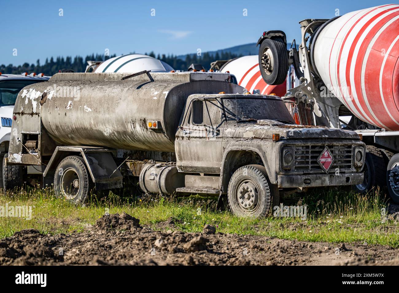 Covered in a crust of cement middle duty old white vintage retro day ...