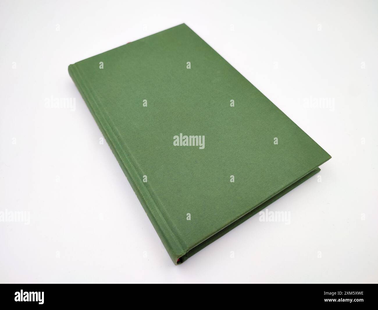 Plain green book hardcover mockup closeup photoshoot on white ...