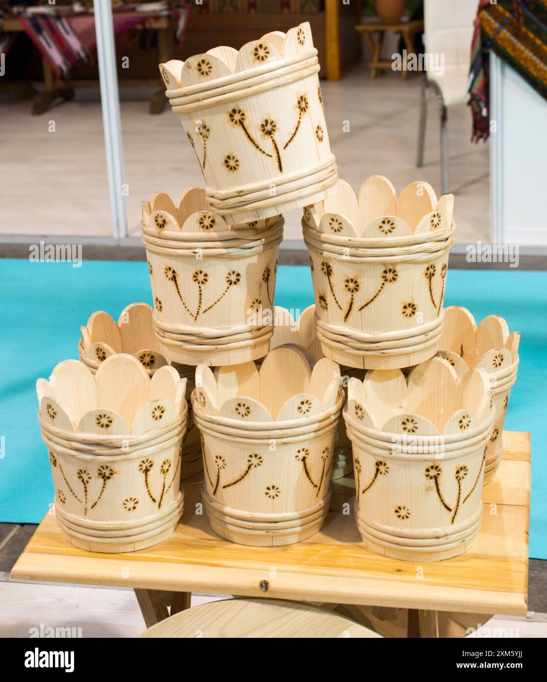 Set of buckets made of wood in a market place Stock Photo - Alamy
