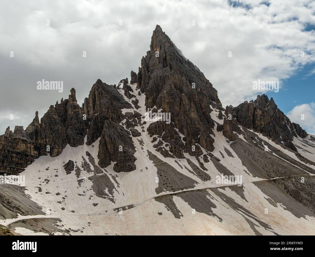 Snowy Tre Cime Circuit Trail with Dolomite summits partially obscured ...