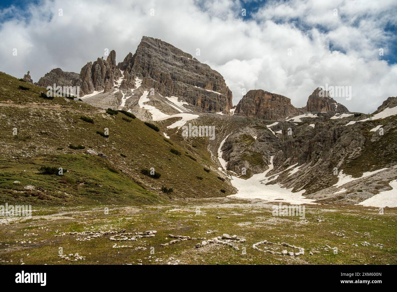Snowy landscape on Tre Cime Circuit with Dolomite summits emerging from ...