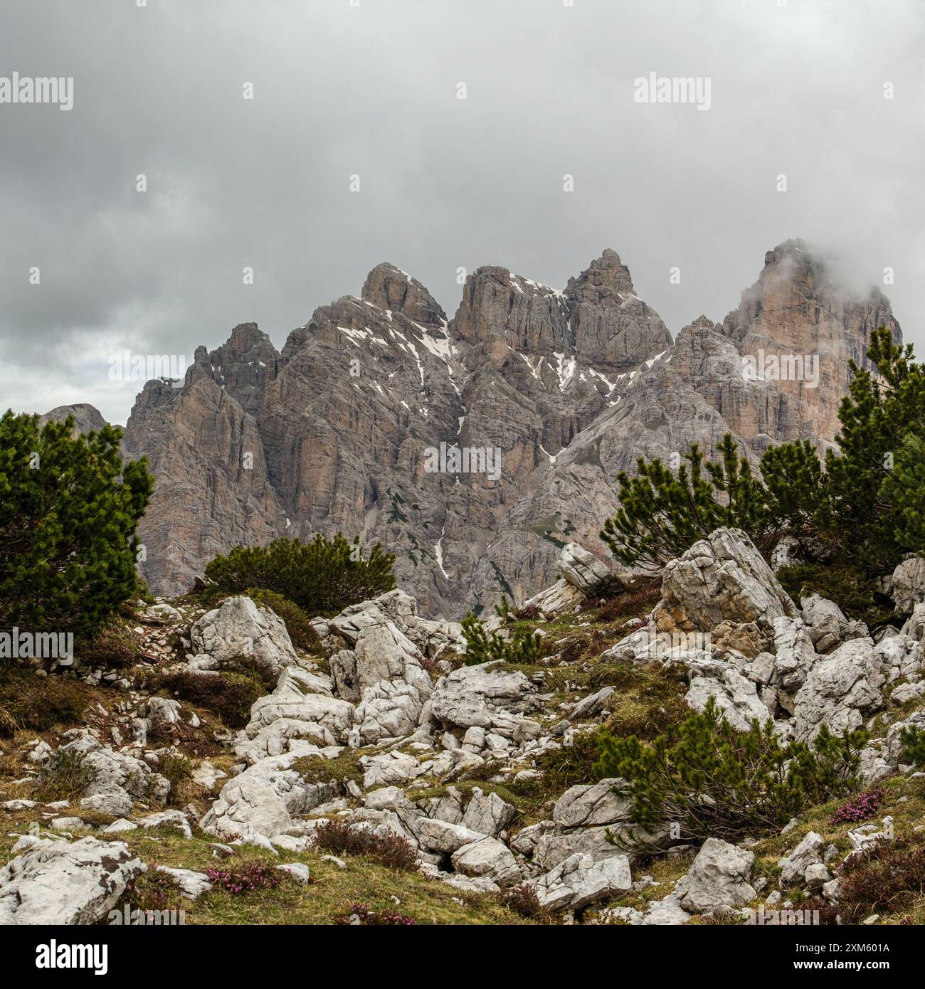 Hiking the snow-clad Tre Cime Circuit with Dolomite summits partially ...