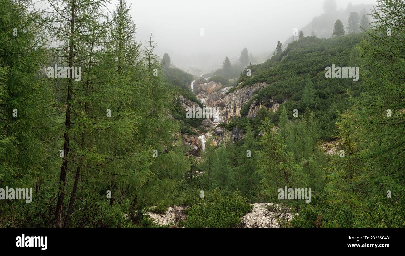 Stunning waterfall flows through serene hi-res stock photography and ...