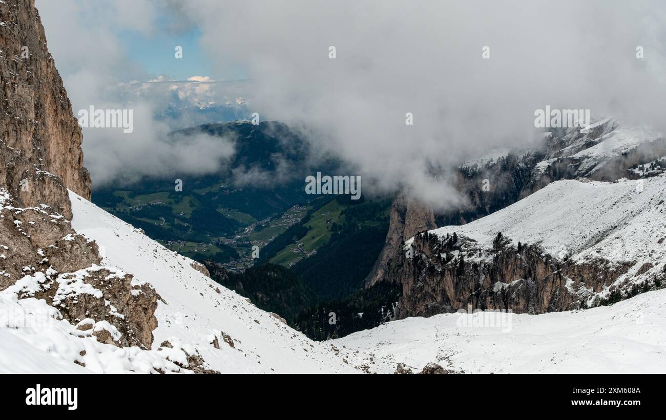 From the Cir Group trail, catch a glimpse of Selva di Val Gardena ...