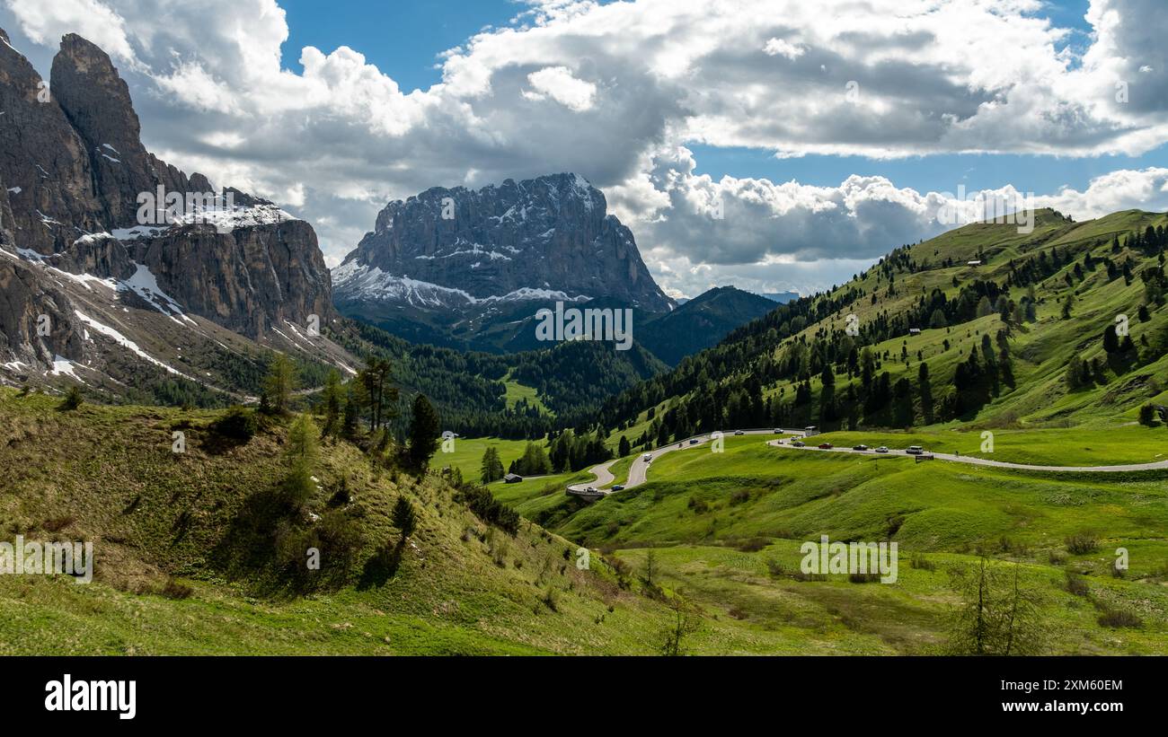 Experience the thrill of the winding road through Gardena Pass, leading ...