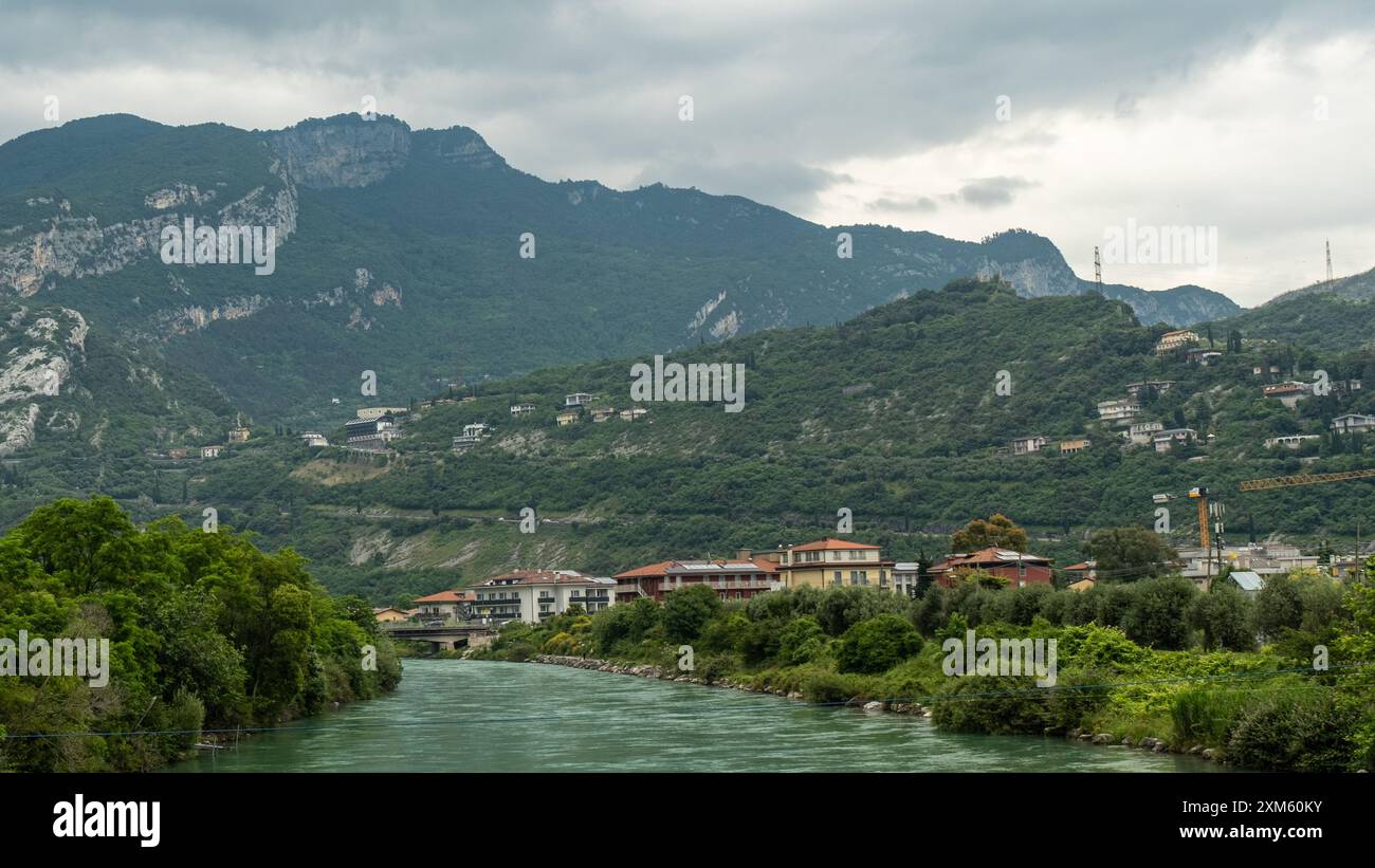 Witness the peaceful flow of Sarca River as it makes its way from Lago ...