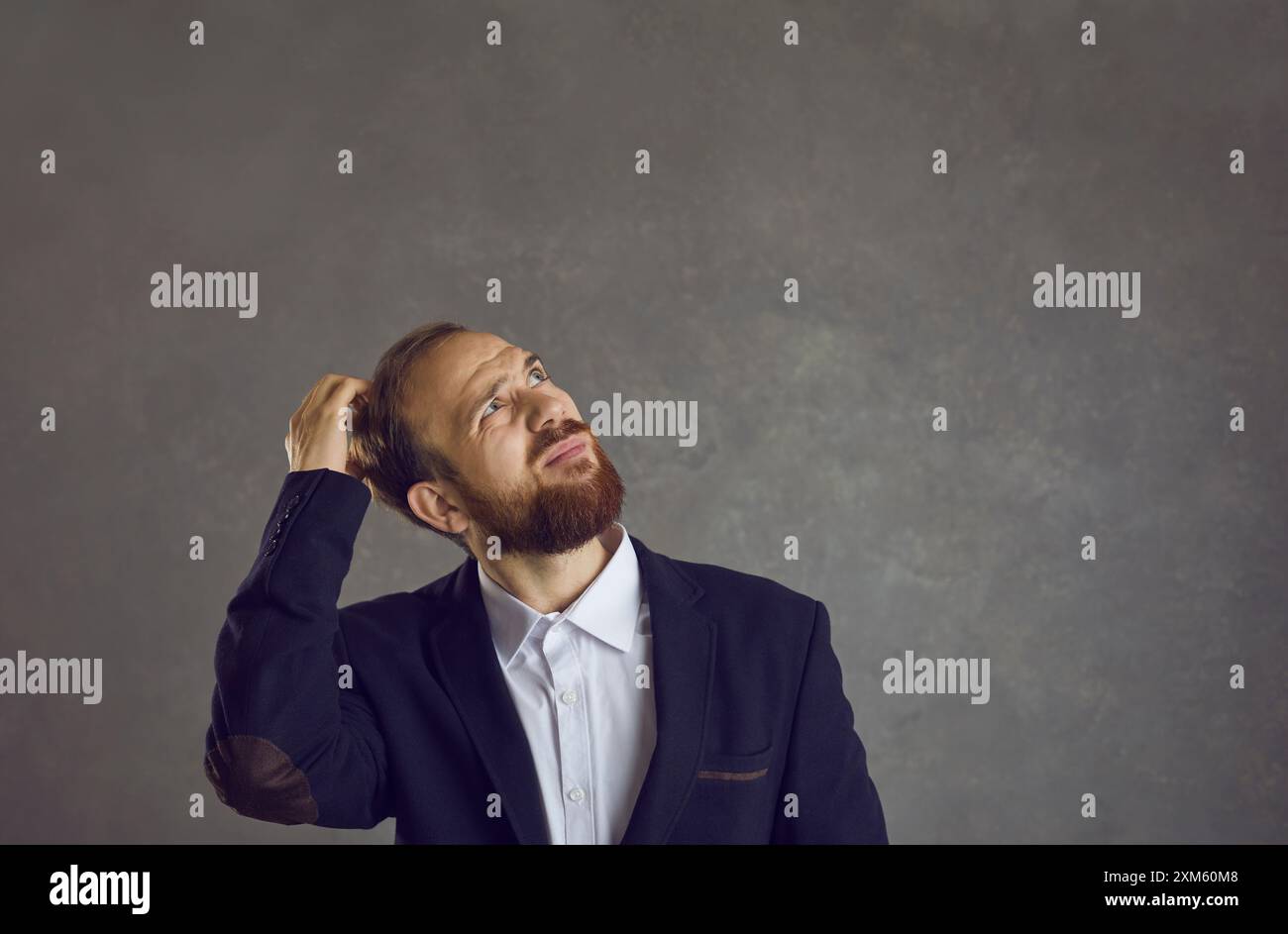 Office worker scratching head hi-res stock photography and images - Alamy
