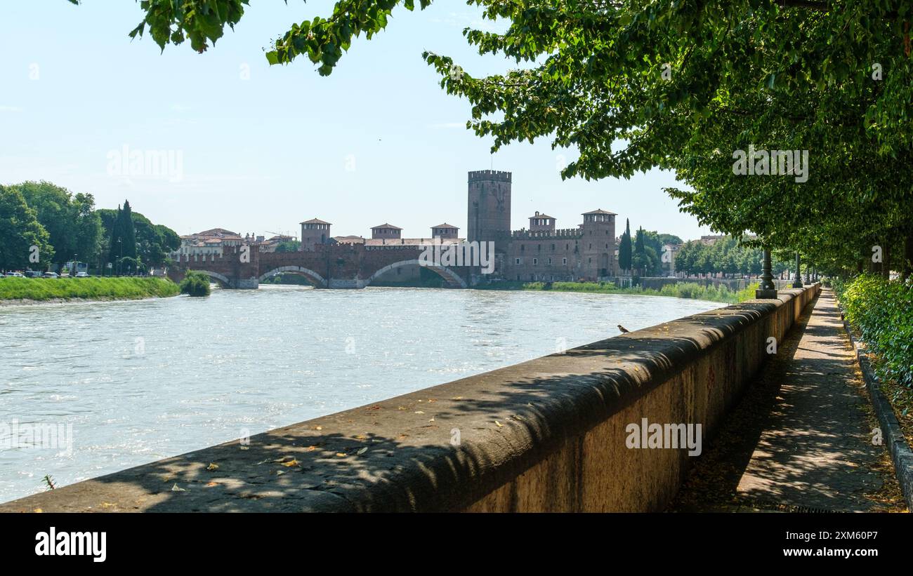On a hot summer day, Verona’s sunlit streets and historic architecture ...