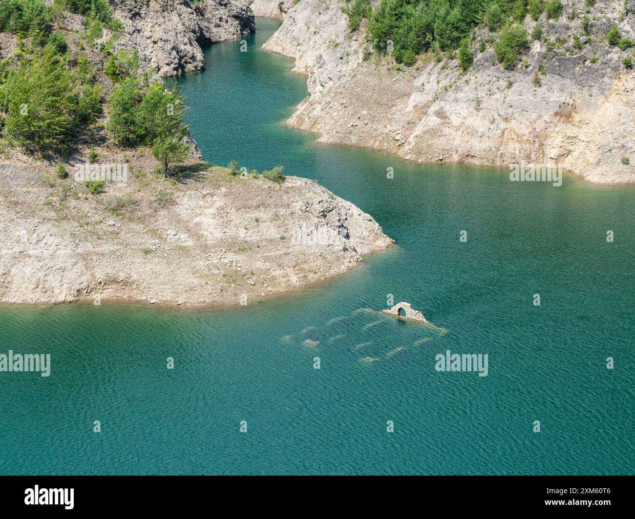 The weathered ruins by Lago di Valvestino offer a fascinating glimpse ...