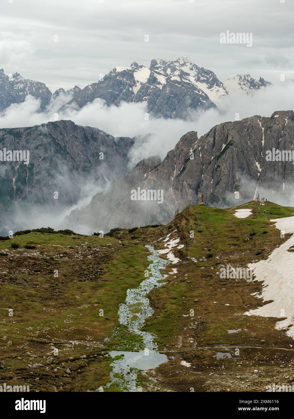 Tre Cime Circuit in June: Snow and clouds create an enchanting scene ...