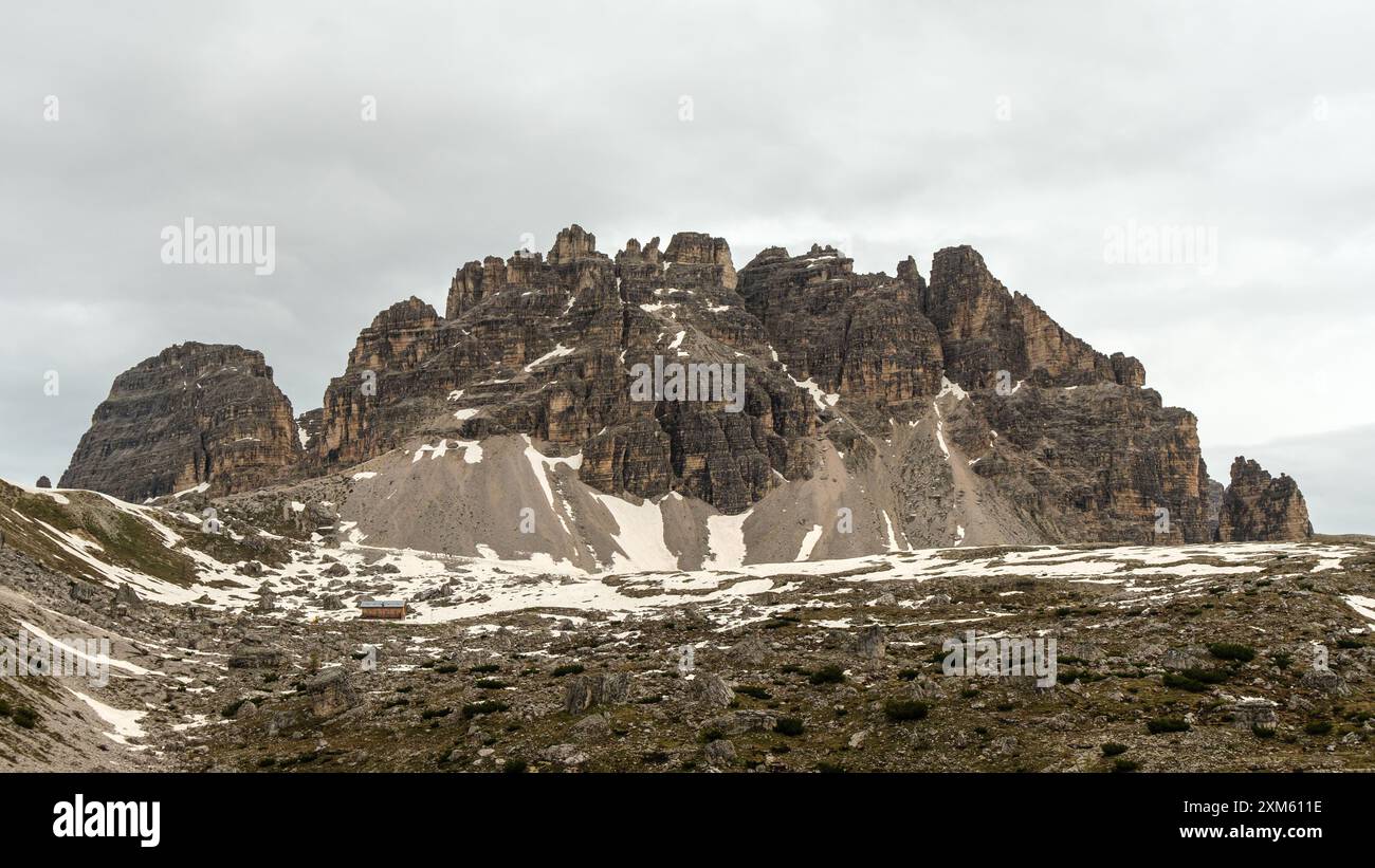 Tre Cime Circuit in June: Snow and fog create a captivating backdrop ...
