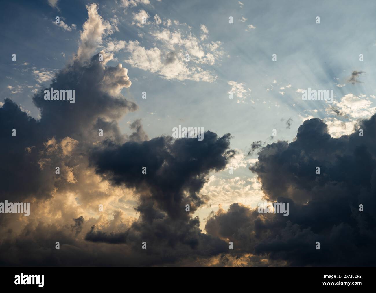 It's sunset time. Storm clouds. Dark clouds in the sky before the rain ...