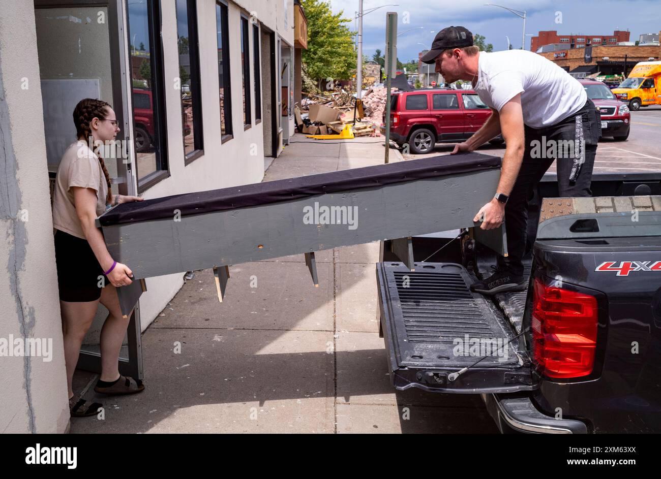 Allison Graves, left, of New York Mills, N.Y., owner of the now ...