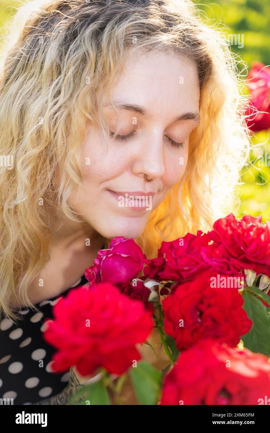 Woman and roses hi-res stock photography and images - Alamy