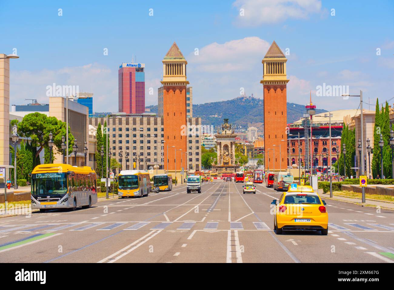 Barcelona, Spain - July 16, 2024: Lively scene of taxis and buses ...