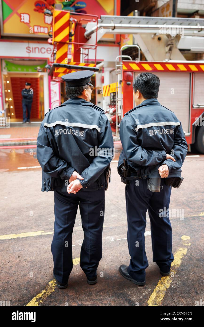 Police officers providing order near the shopping mall Stock Photo - Alamy