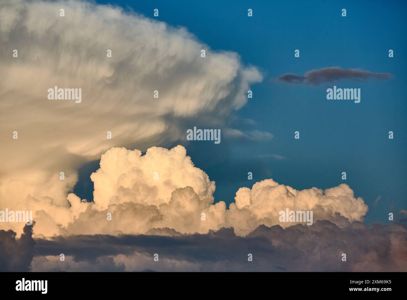 Dramatic cloudscape of a thunderstorm with cumulus nimbus clouds in ...