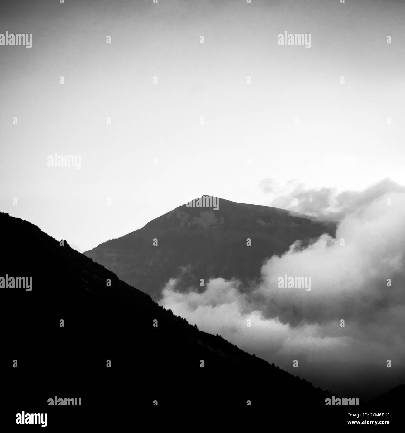 Misty Mountain Landscape Shrouded in Clouds at Dusk Near Remote ...