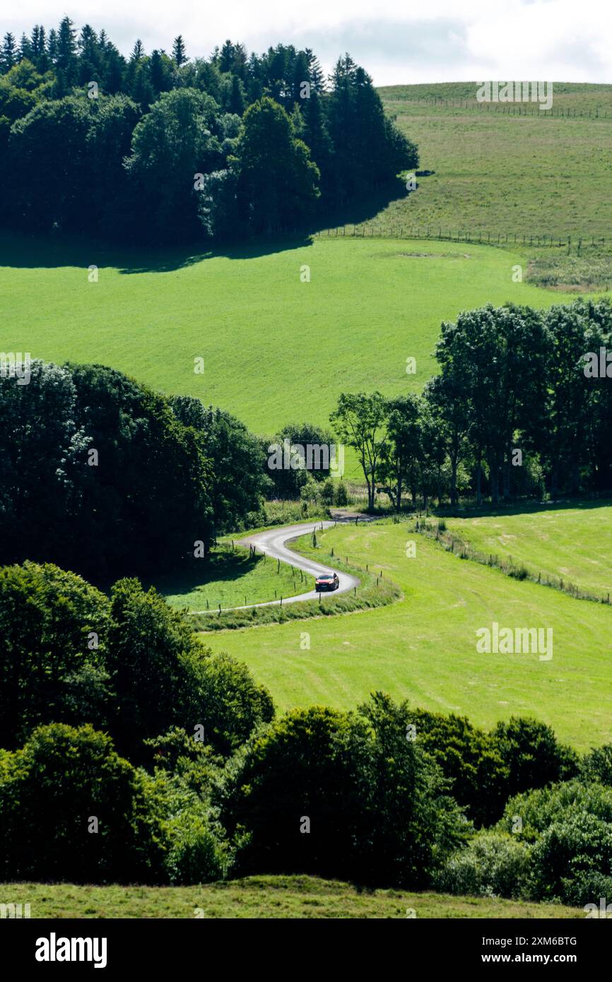 Winding road cuts through hi-res stock photography and images - Alamy