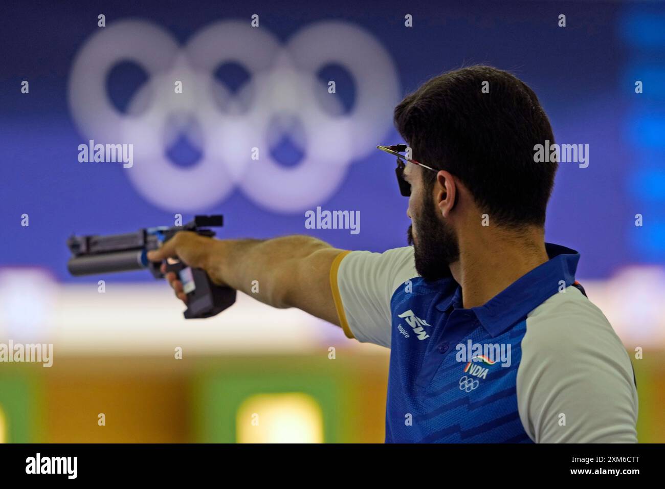 India's Arjun Singh Cheema participates in the 10m Air Pistol Men Pre ...