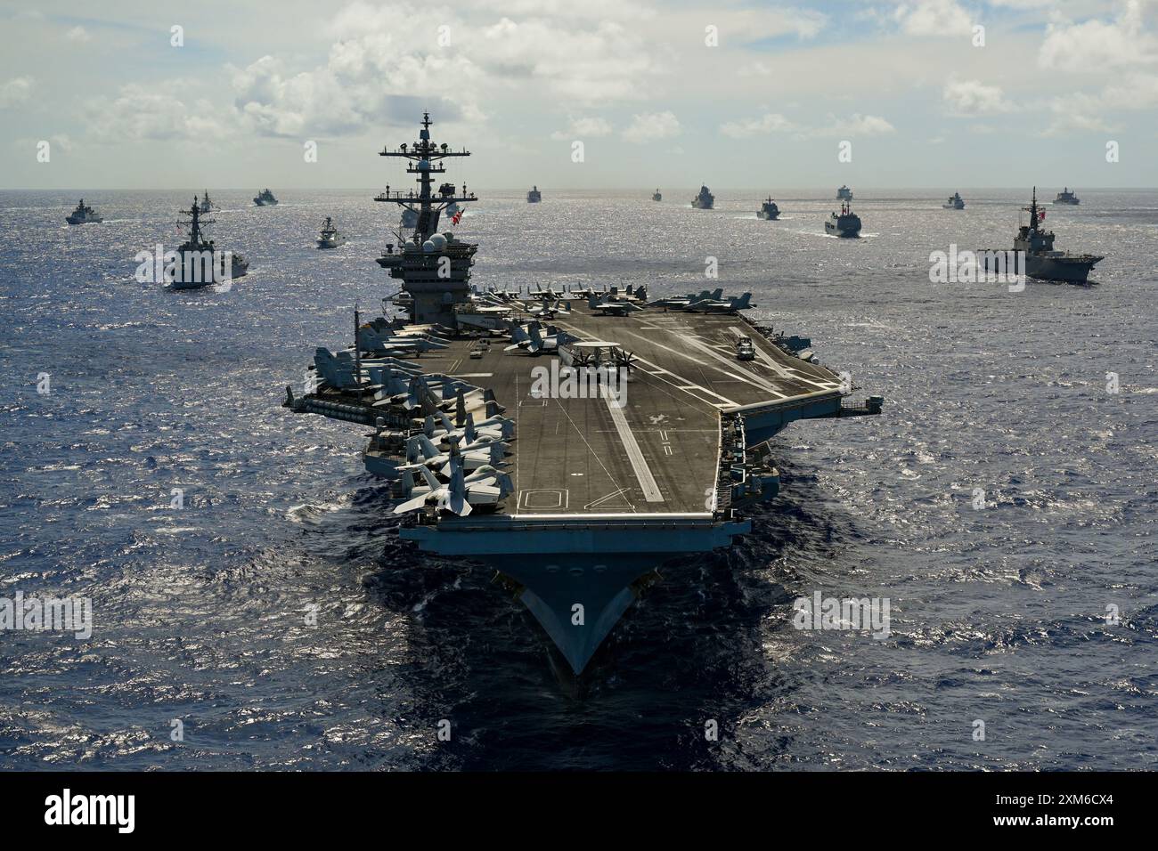 The Nimitz-class aircraft carrier USS Carl Vinson (CVN 70) leads a group sail July 22, off the ...