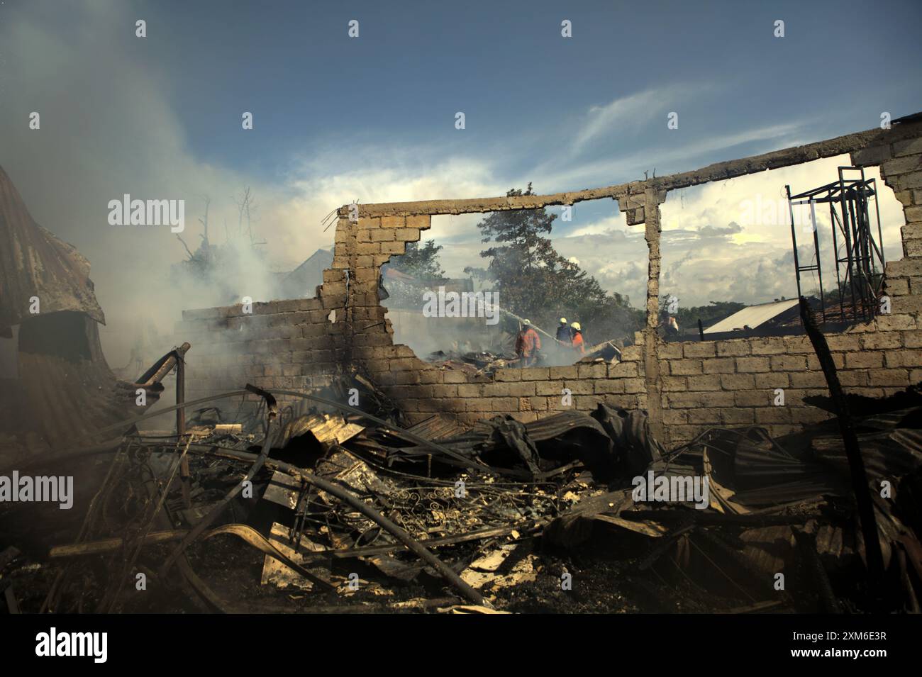 A scene after a fire accident burned down storage buildings of a home ...