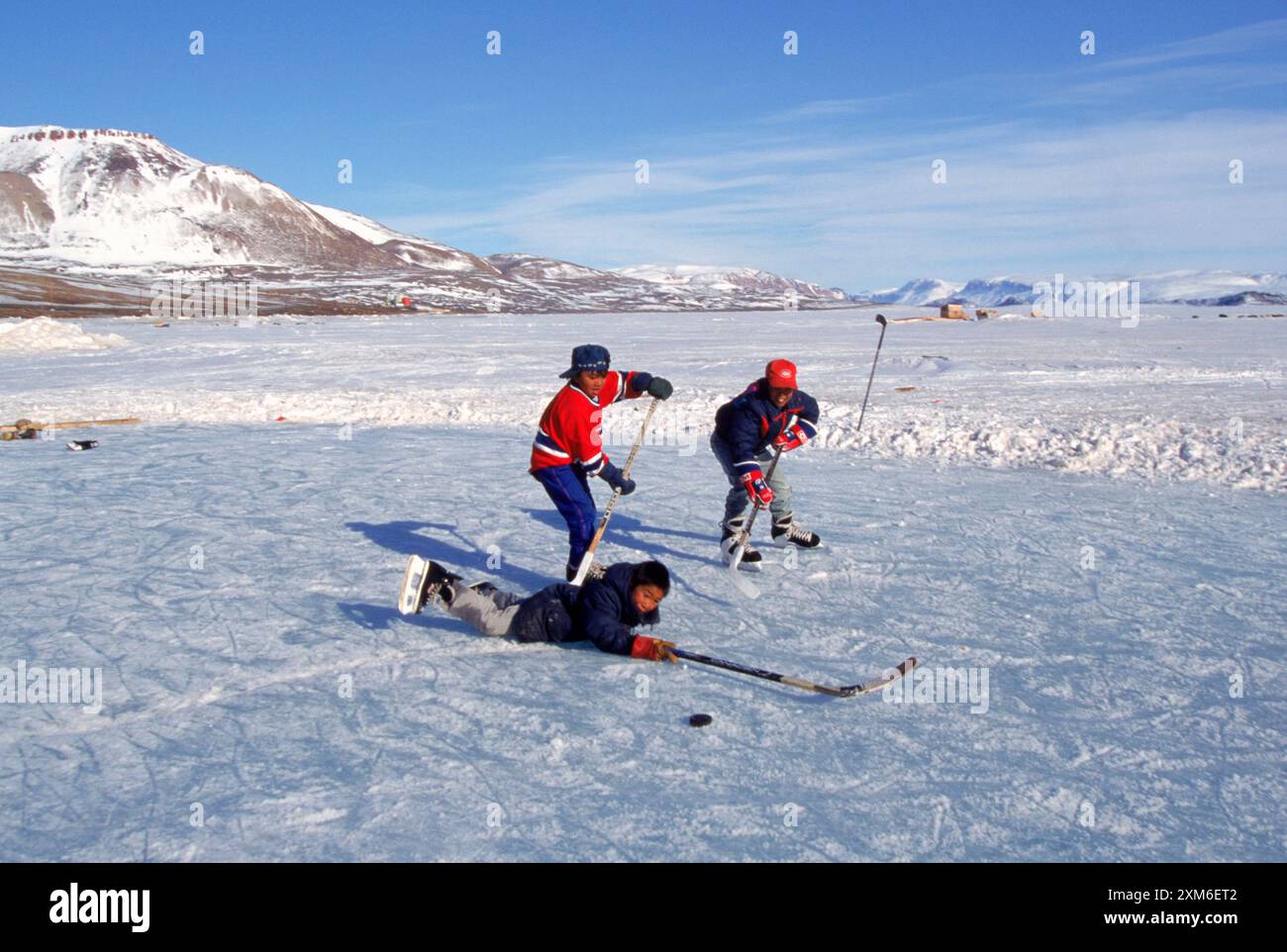 Children playing hockey, Arctic Bay, Nunavut, Canada Stock Photo - Alamy