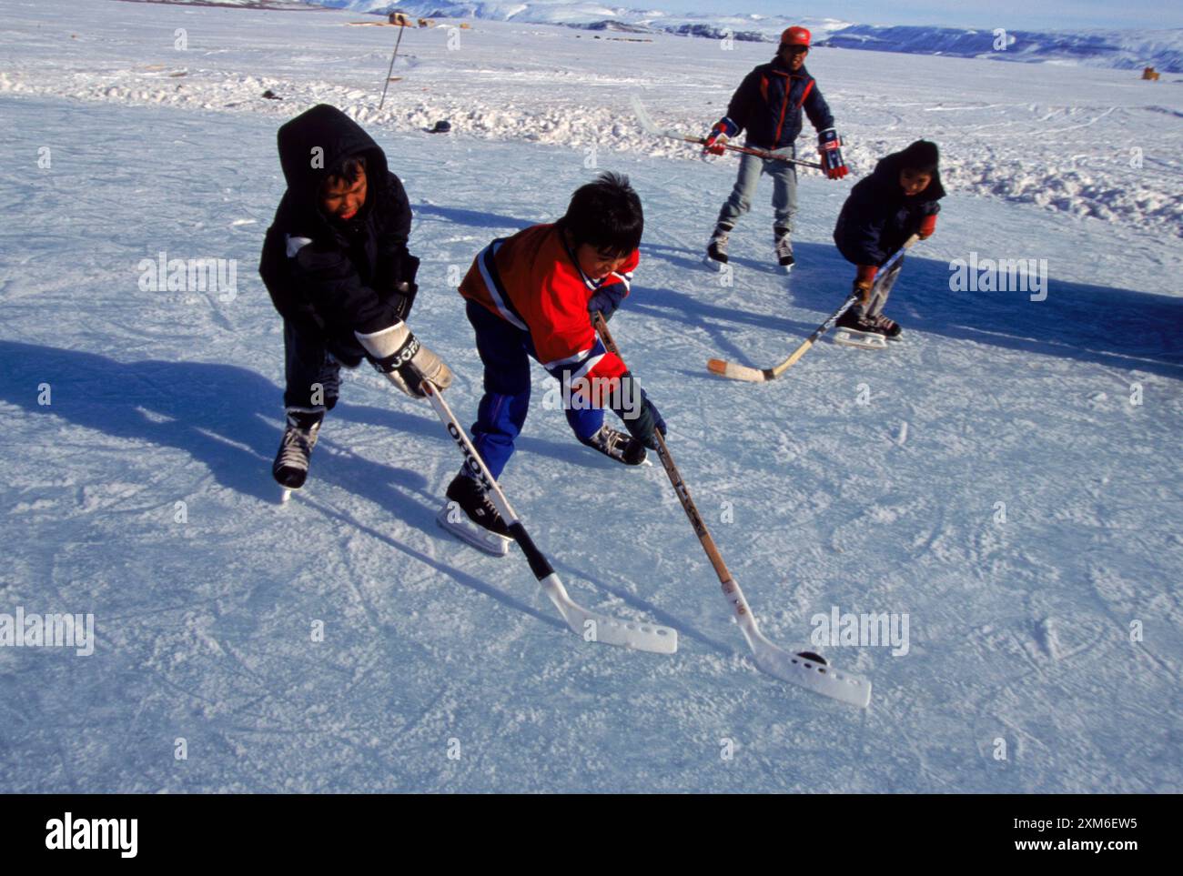 Children playing hockey, Arctic Bay, Nunavut, Canada Stock Photo - Alamy