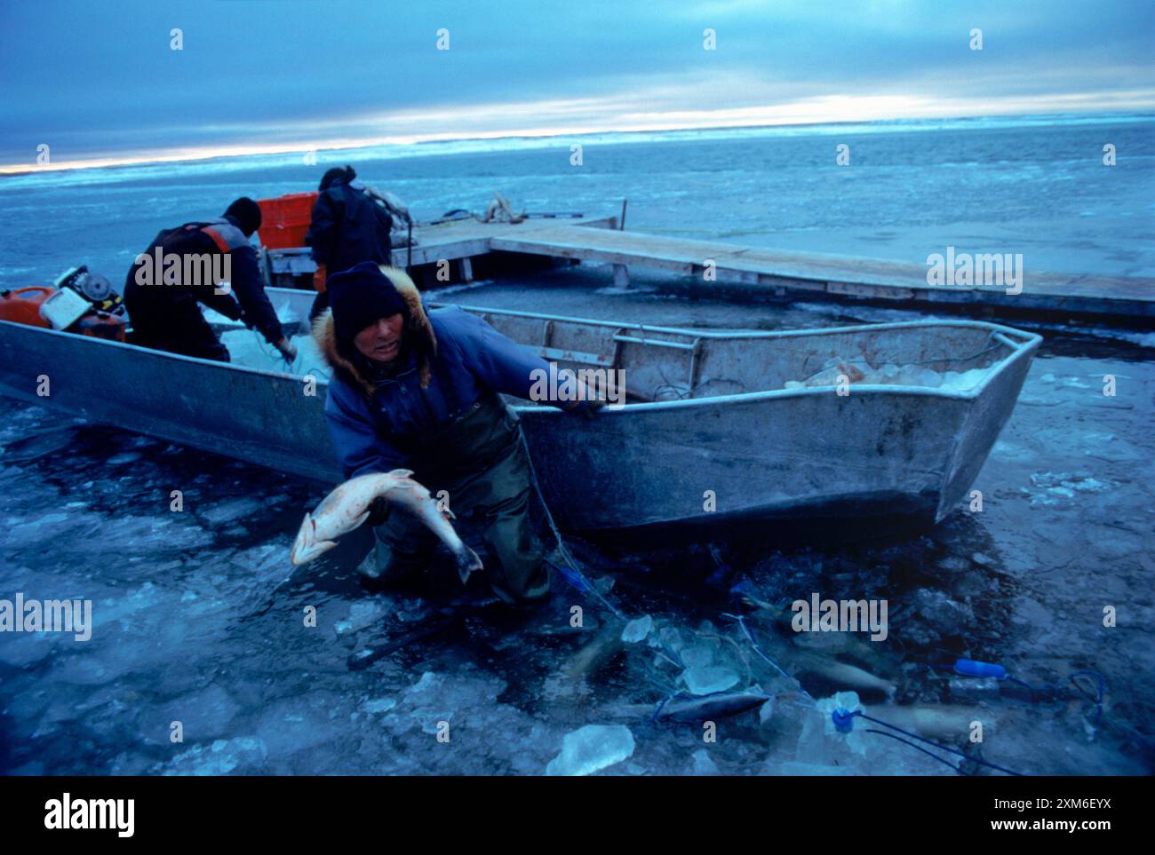 Fishermen bring in boats hi-res stock photography and images - Alamy