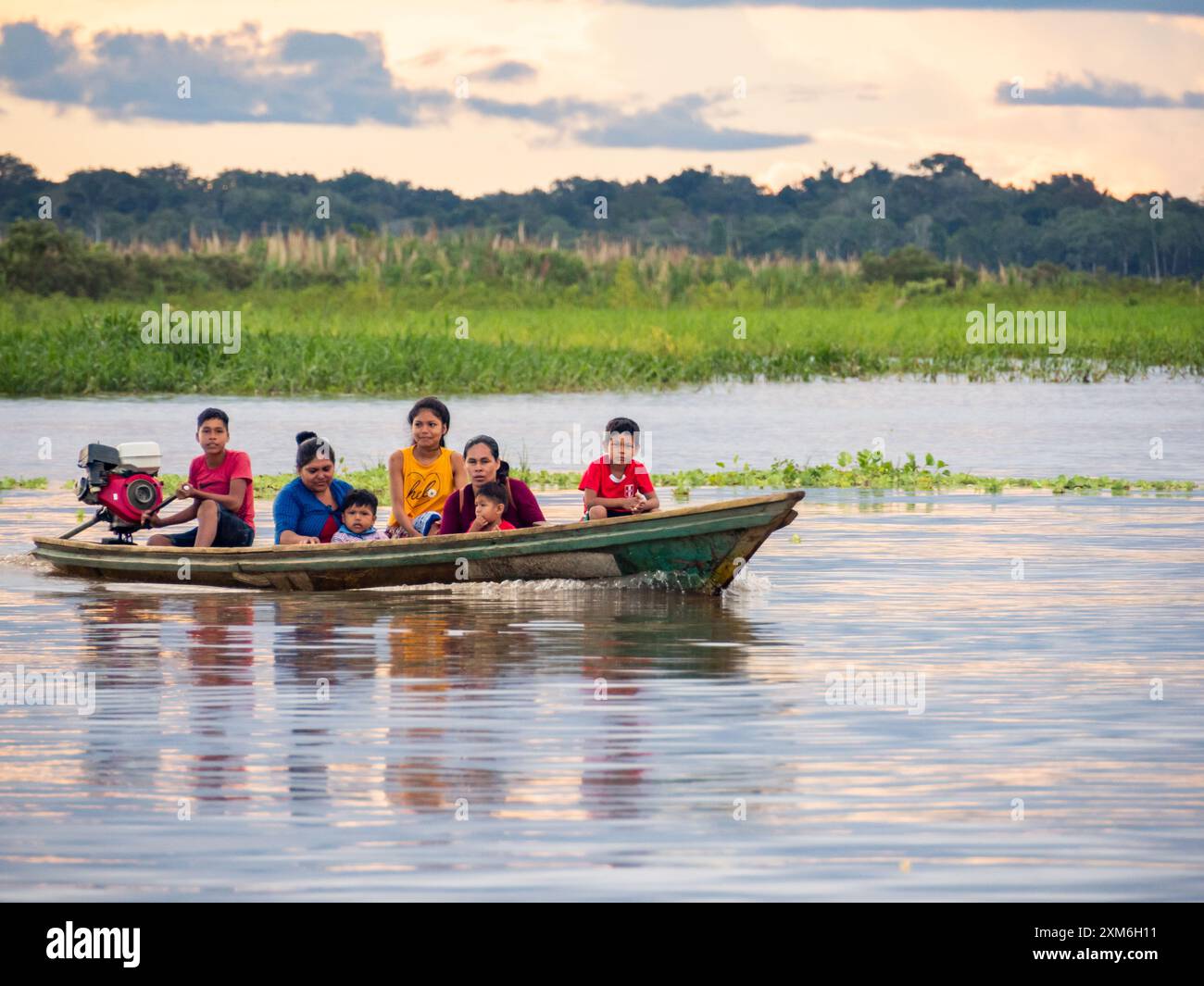 Nauta, Peru - Apr, 2022: Native Amazon people in traditional boat ...