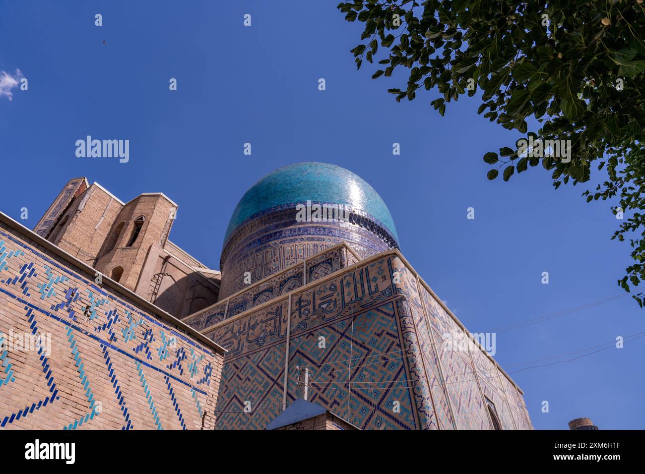 A blue dome on top of a building with a blue sky in the background ...