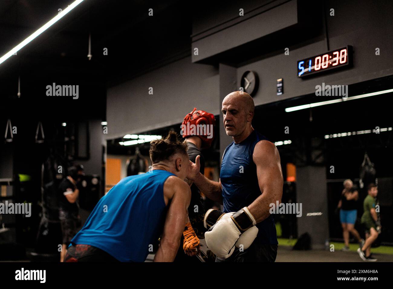 Boxers fighting in boxing training in the gym Stock Photo - Alamy