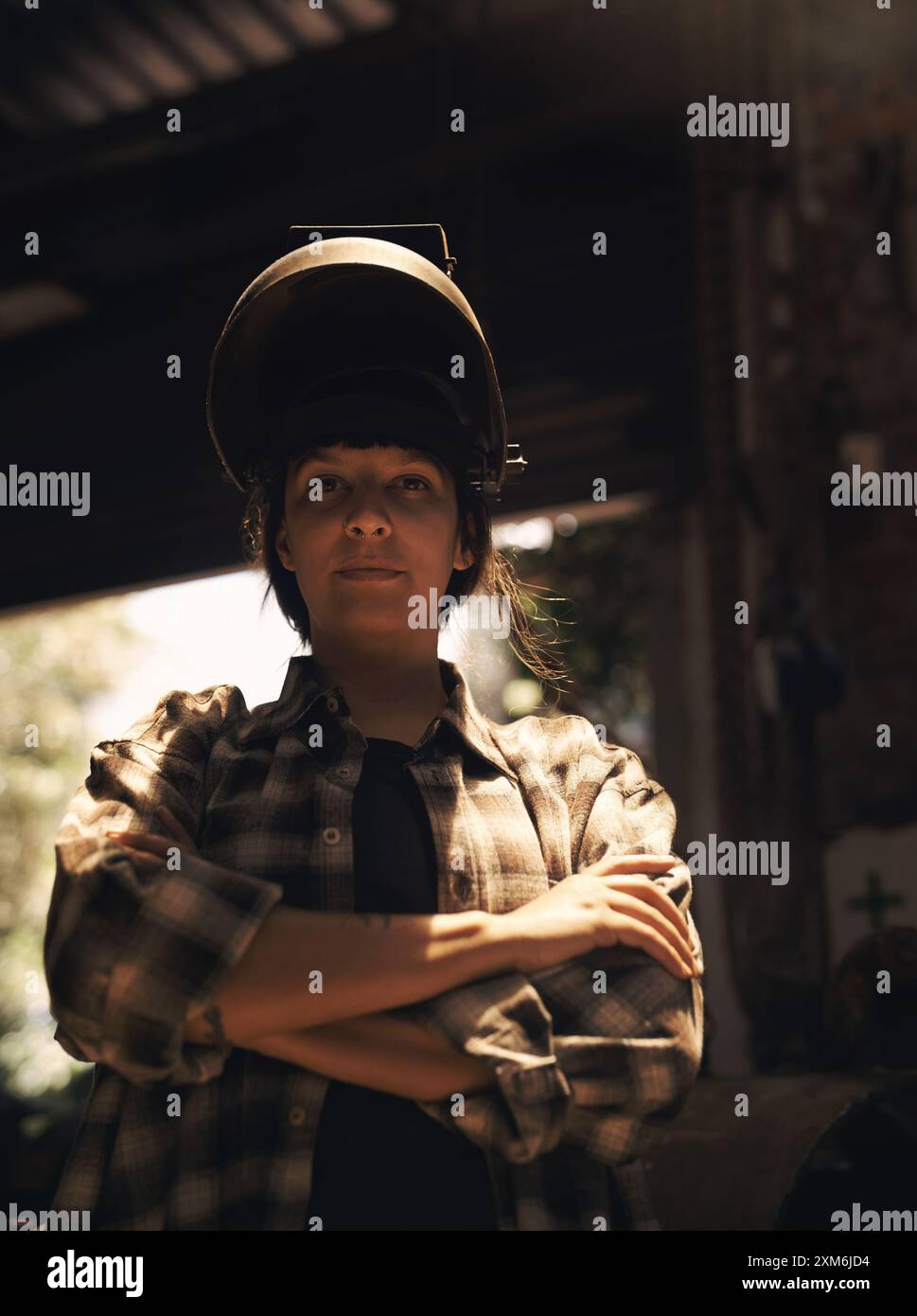 Small business, woman and welder with arms crossed at workshop with ...