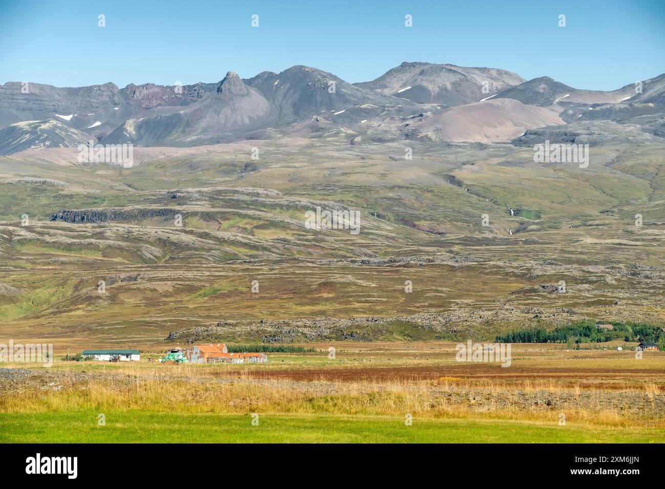Remote farmhouse with vast greenery and mountains Stock Photo - Alamy
