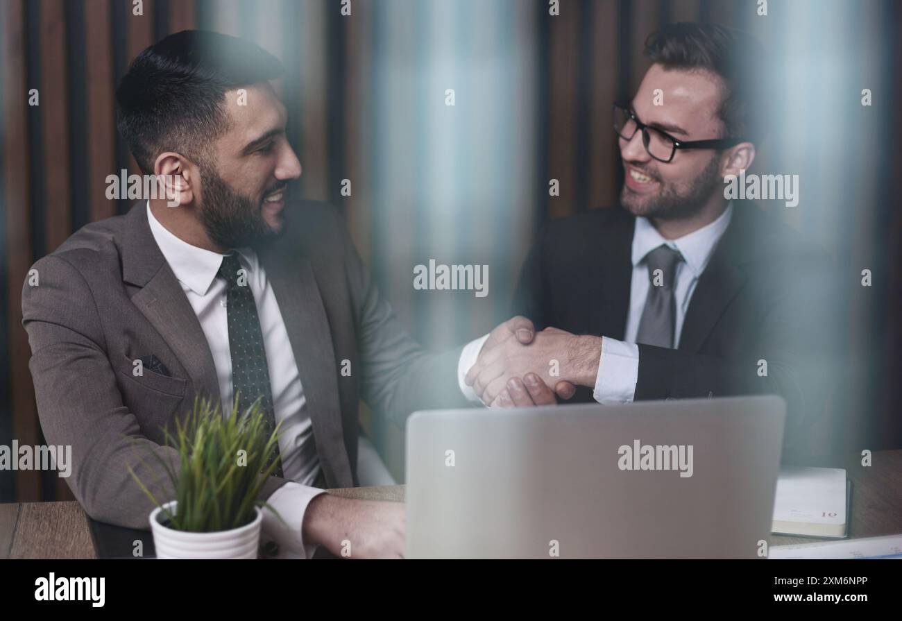 Two happy people make a good business deal and exchange confident ...