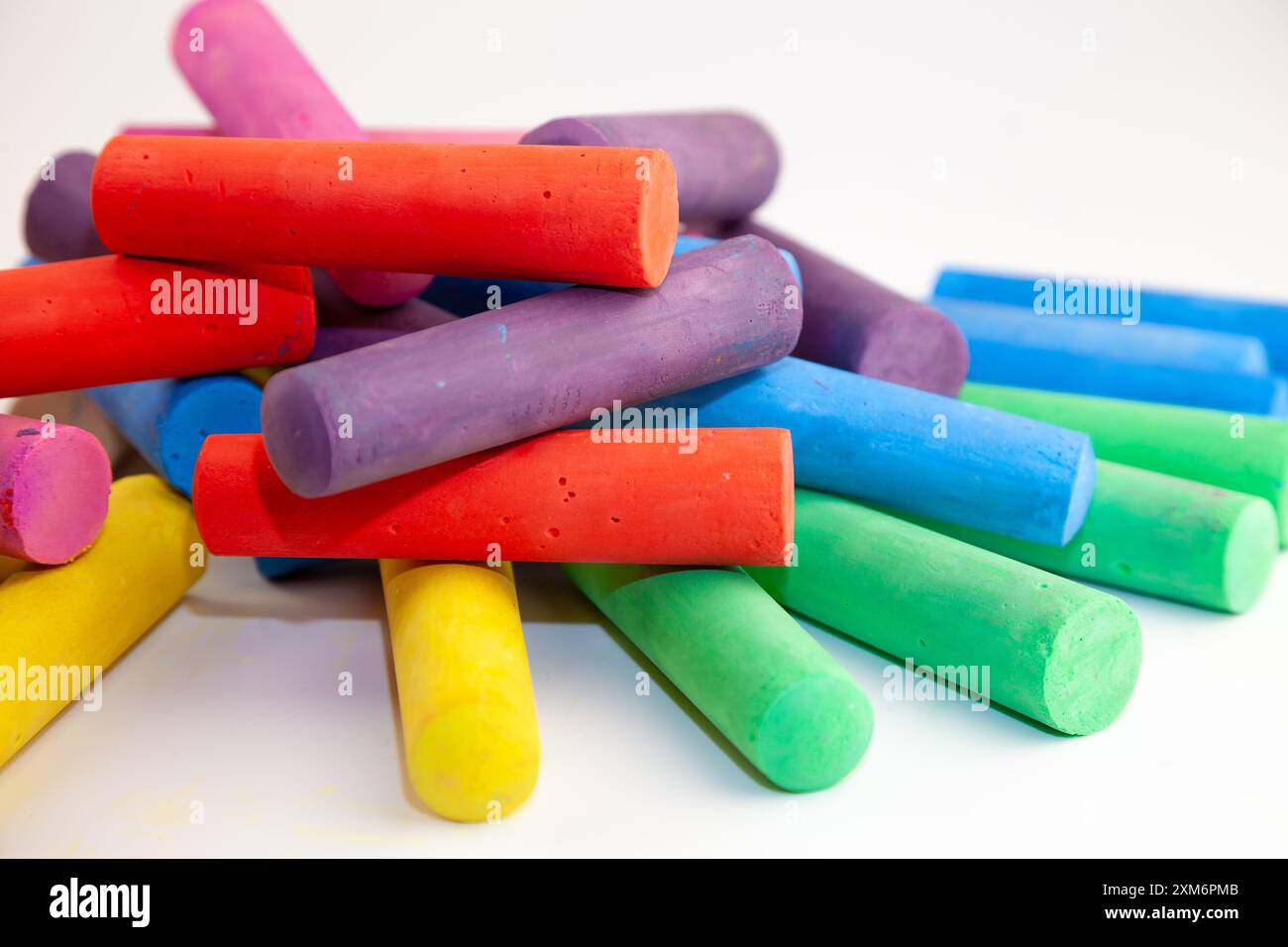 Set of colorful chalks for the board and the street. Drawing chalk ...