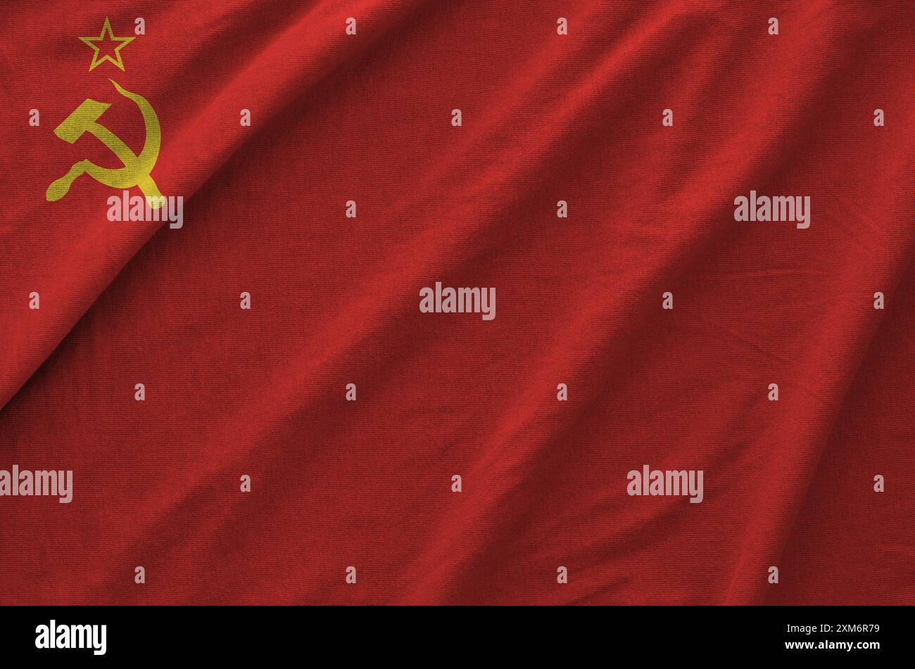 Soviet Union flag depicted on folded wavy fabric of old cloth close up ...