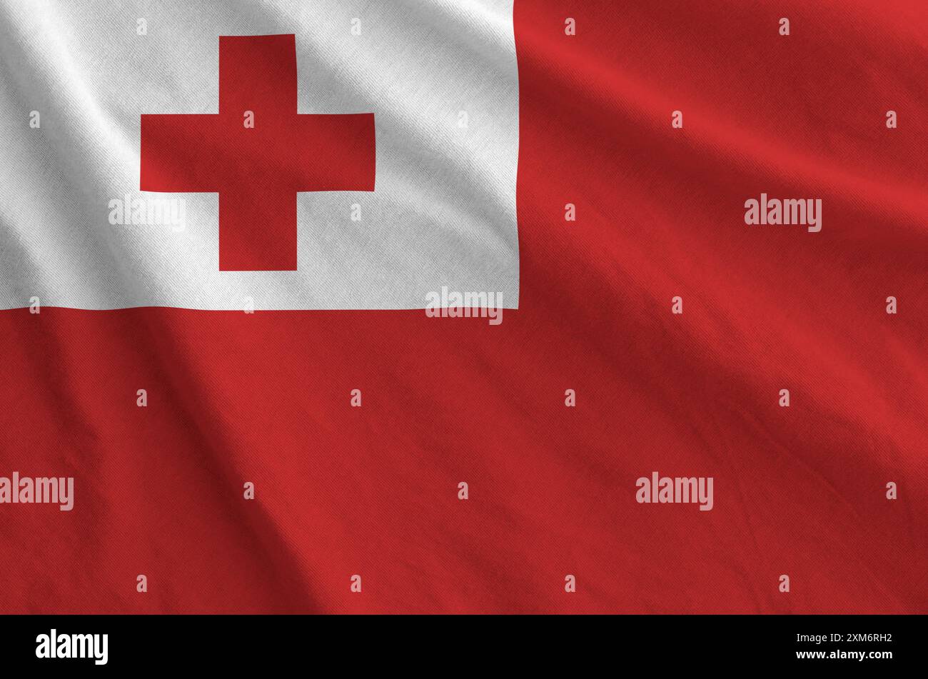 Tonga flag depicted on folded wavy fabric of old cloth close up Stock ... Tonga flag depicted on folded wavy fabric of old cloth close up Stock ...