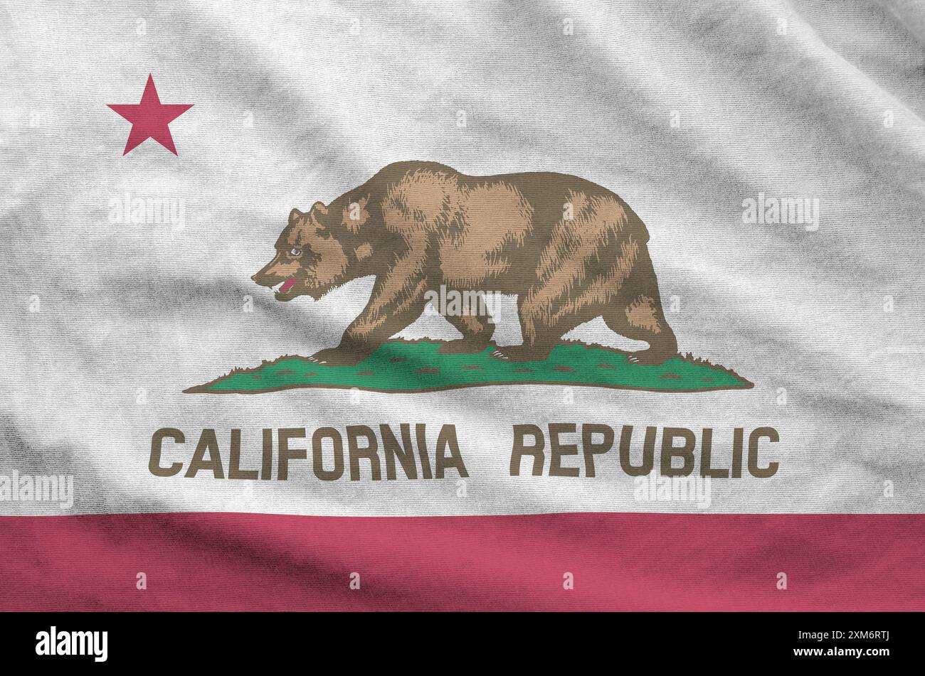 California US state flag depicted on folded wavy fabric of old cloth ...