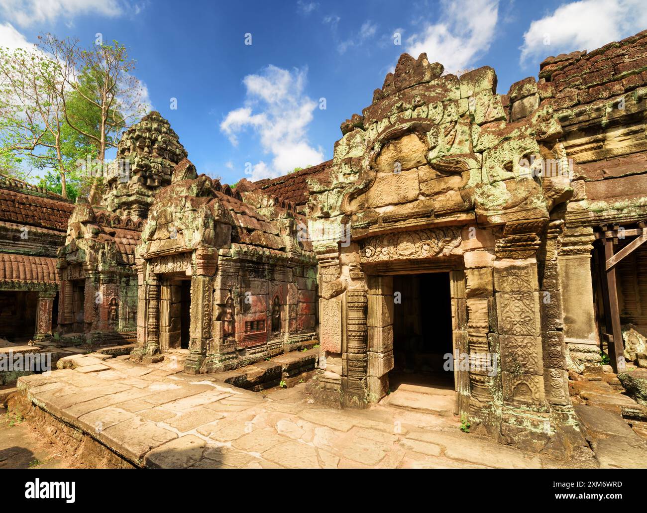 Ancient mossy buildings with carving of Preah Khan temple Stock Photo ...
