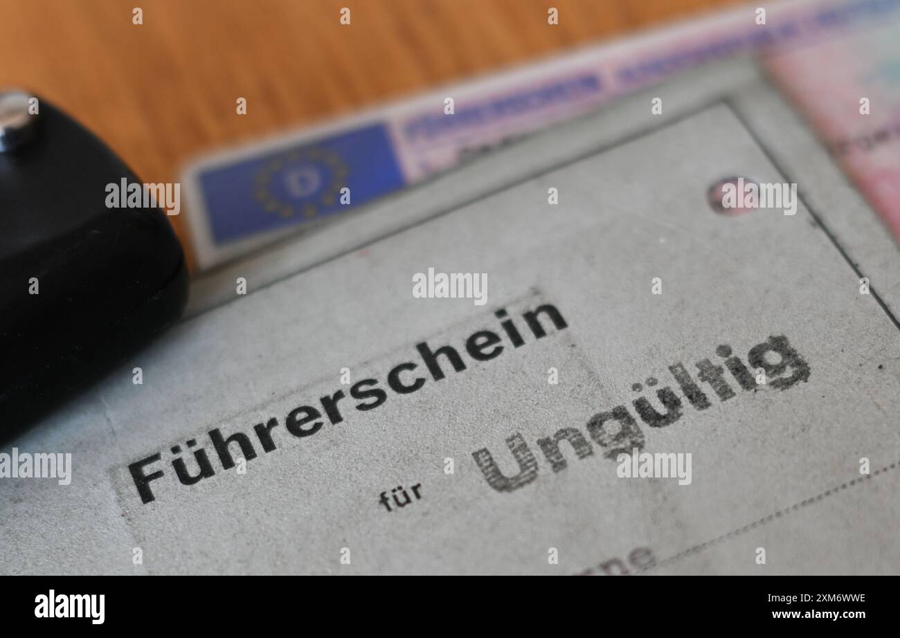 ILLUSTRATION - 23 July 2024, Hesse, Frankfurt/Main: An invalid old ...