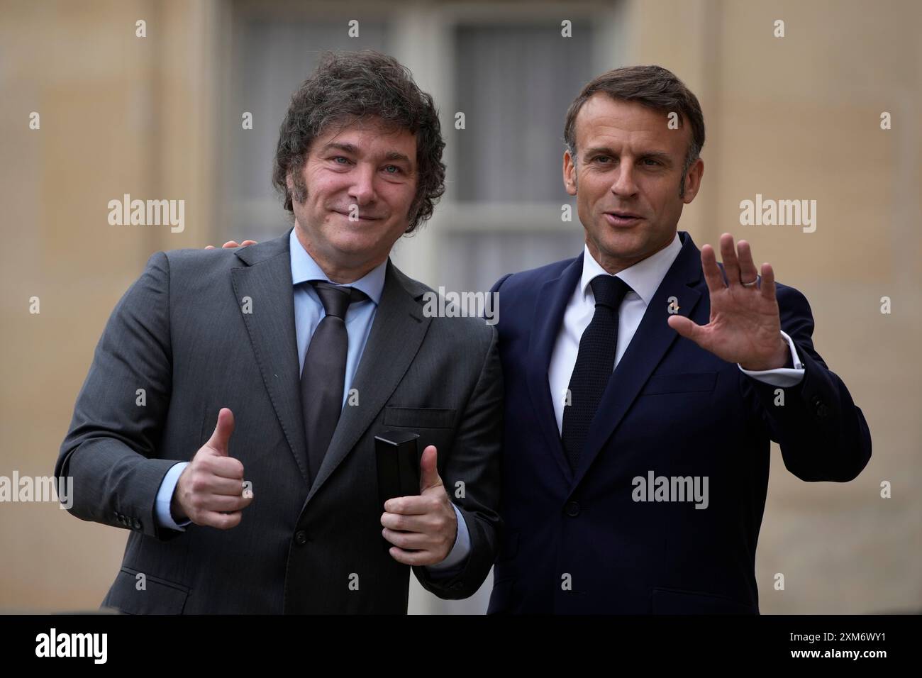French President Emmanuel Macron, right, and Argentina's President ...