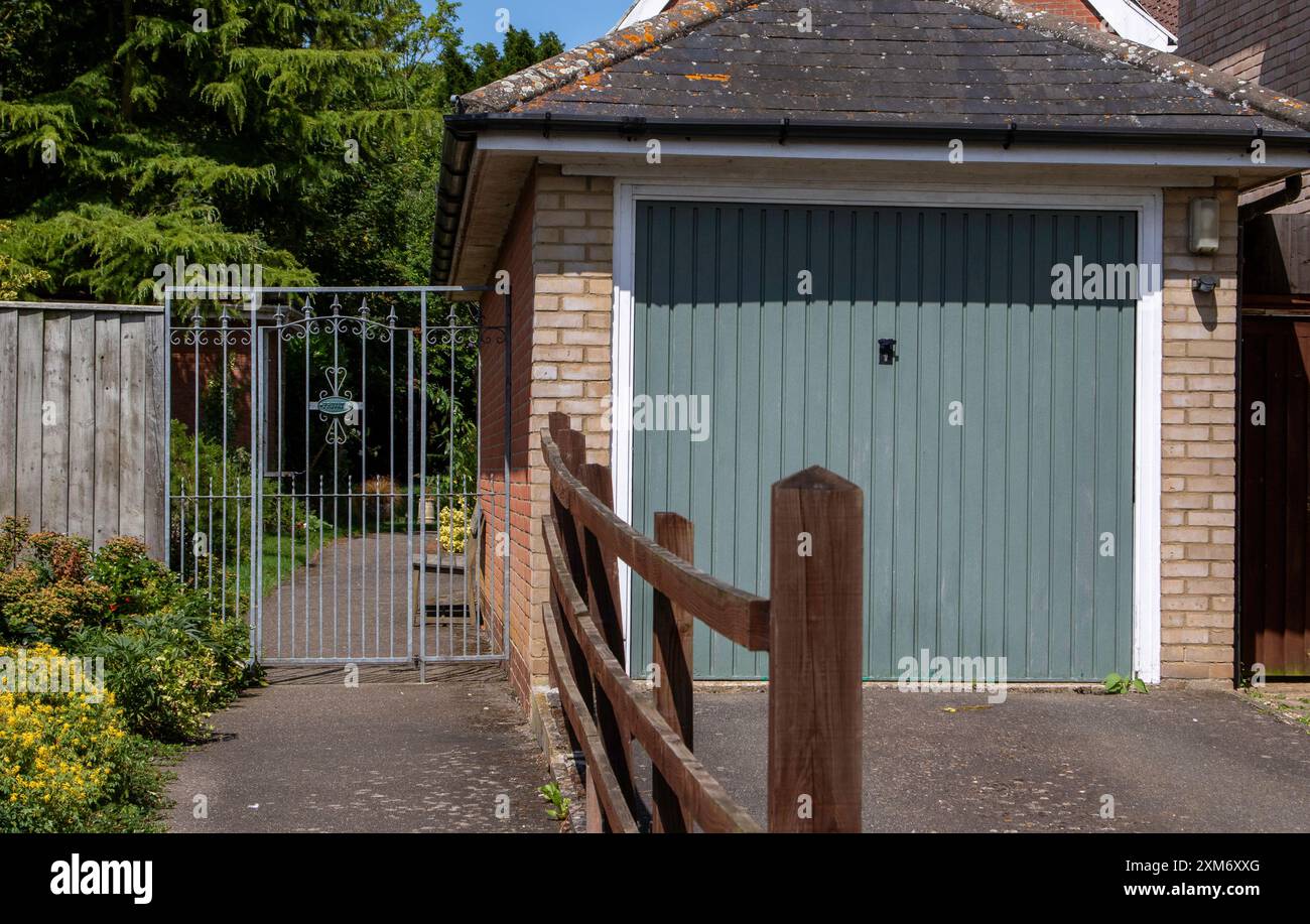 Attractive decorative metalwork gate/door marks a clear boundary at the ...