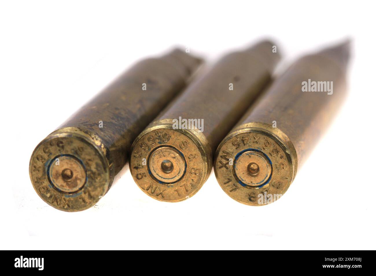three metal bullets isolated on the white background Stock Photo - Alamy