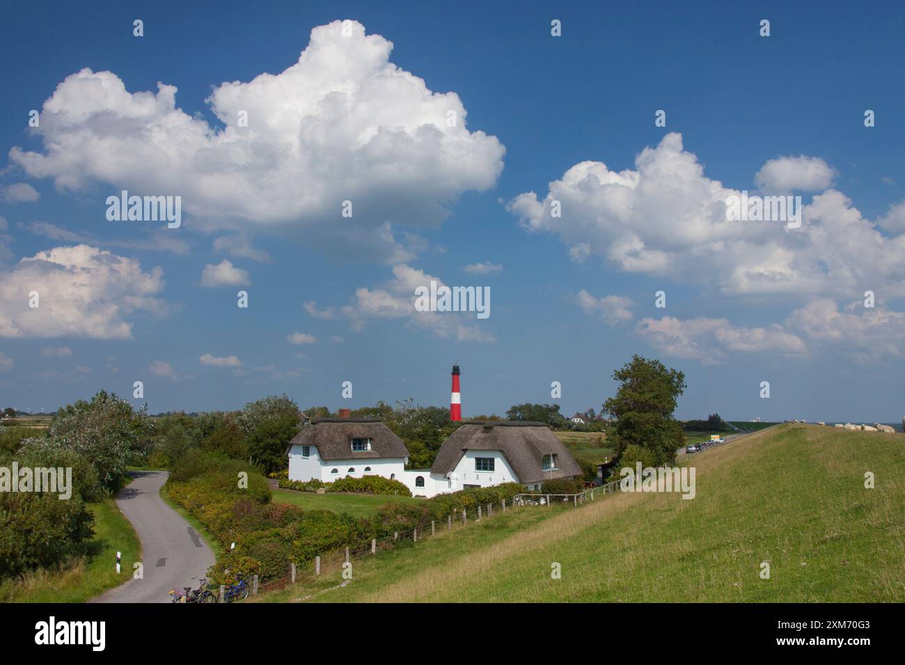 Lighthouse, thatched roof house, Pellworm Island, North Frisia ...