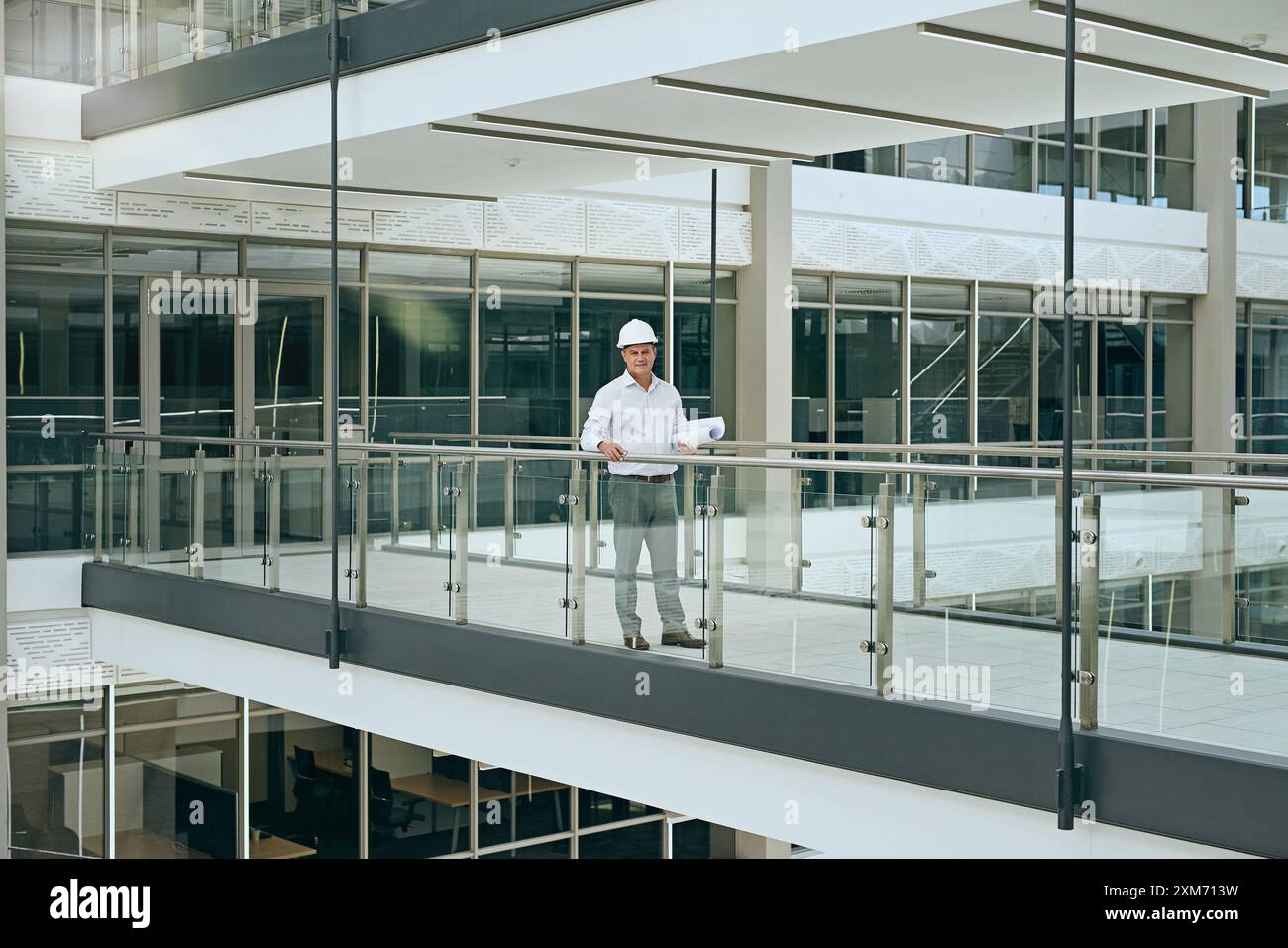 Portrait, engineer and man with blueprints, architecture and renovation ...