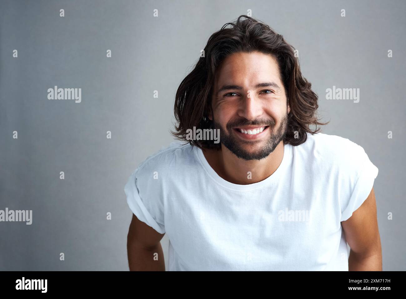 Smile, confidence, and portrait of man in studio with mockup, casual ...