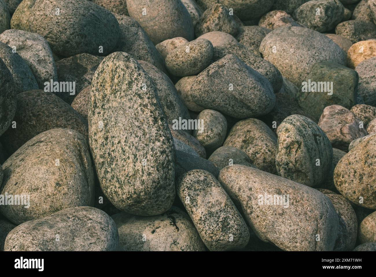 Textured Granite Boulders Piled in Natural Setting at Dusk Stock Photo ...