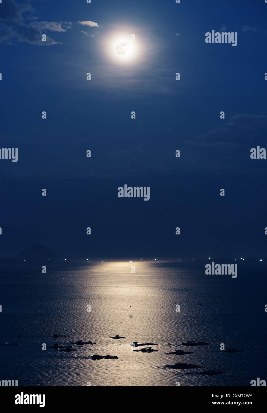 Dark blue sky reflected in shore water hi-res stock photography and ...
